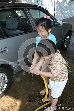 Kids Washing Car Stock Photos - Image: 4451443