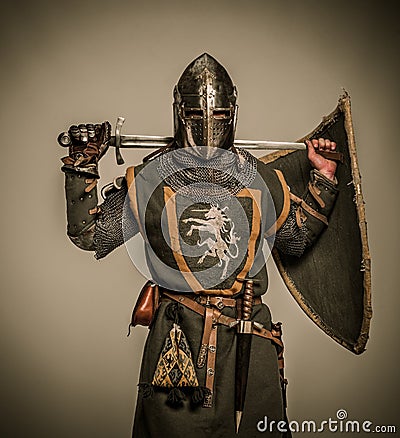 Knight Holding Sword Behind His Back Stock Images - Image: 29479834