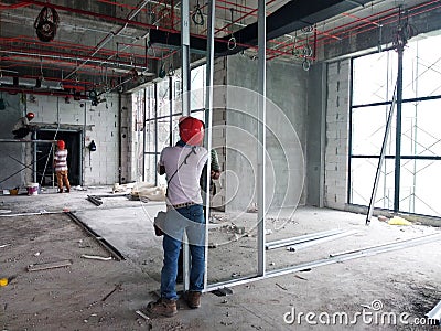 Drywall Installation Work In Progress By Construction Workers At The ...