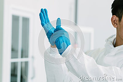 Lab Technician In Personal Protective Equipment PPE Suit Wearing The ...