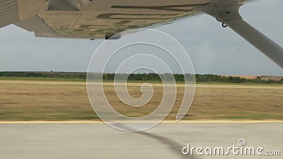 Landing through the Window of a Small Airplane with a Wing in the Frame ...