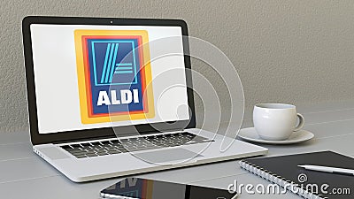 Laptop With Aldi Logo On The Screen. Modern Workplace Conceptual ...