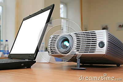 Laptop With Computer Projector On Table Stock Photography - Image: 5606682