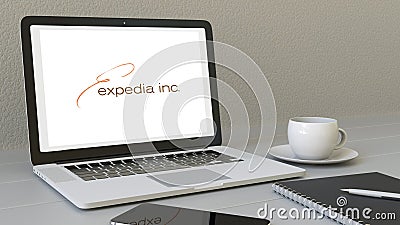 Laptop With Expedia Logo On The Screen. Modern Workplace Conceptual ...