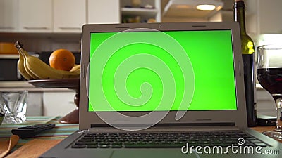 Laptop with Green Screen on the Kitchen Table Stock Video - Video of ...