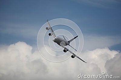 Large Passenger Jet Banking Royalty-Free Stock Photo | CartoonDealer ...