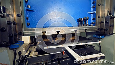 A Large Steel Shaping Machine Presses Down on a Steel Sheet. Stock ...
