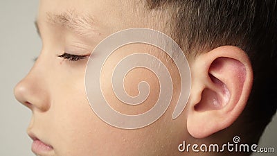 The Left Side of the Child`s Face. the Ear is Close-up. Stock Video ...