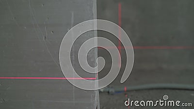 Leveling the Wall with a Laser Level. Lighted Laser Level. Display ...