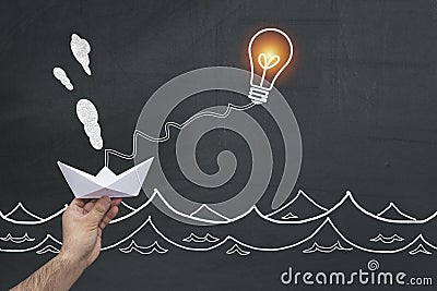 Light Bulb Making Move Paper Boat As A Success Metaphor For Smart ...