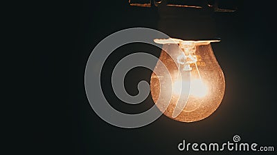 Light Bulb Slowly Turned on and Off on Black Background Stock Video ...