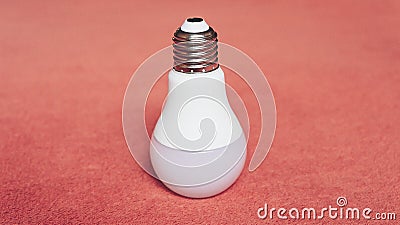Light Bulb On A Soft Fluffy Peach-colored Background Stock Image ...