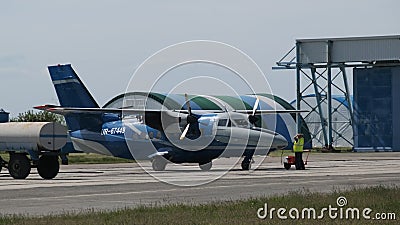 Light-Engine Propeller Aircraft with a Rotating Propeller Stands at the ...