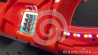 Lighted Coin Slots of a Red Arcade Game Machine with Blinking Lights ...