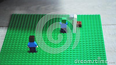 Little Boy Playing Construction Set. Minifigures Made of Cubes ...