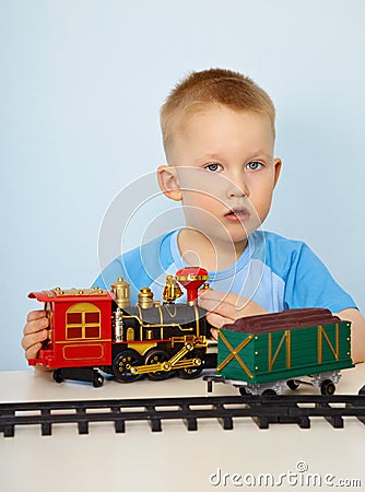 Little Boy Playing With A Toy Locomotive Royalty-Free Stock Photography ...