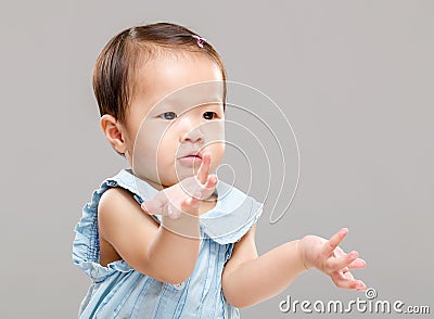 Little Girl With Hand Posture Stock Photo | CartoonDealer.com #40943999