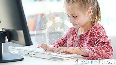 Little Girl Typing on Keyboard during Lesson Stock Video - Video of ...