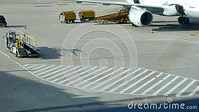 Loading Baggage of Passengers on a Plane at the Airport Stock Footage ...