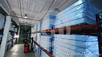 The Loader Loads a Warehouse Mattresses, Orthopedic Mattresses on ...