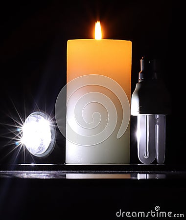 Loadshedding From Eskom Torch Candle And Lightbilb Royalty-Free Stock ...