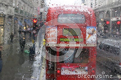 A London Bus In The Rain Royalty Free Stock Photography - Image: 13063367