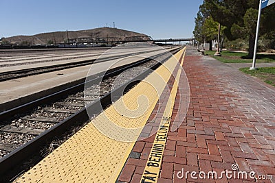 Long Parallels Merging Train Tracks And And Platform Converging Into A ...
