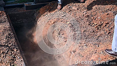 Low Angel View of People Filling Grave with Sand Stock Video - Video of ...
