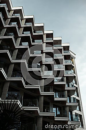 Facade Of Building, With Triangular Balconies With Glass Railings ...