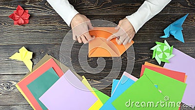 Making origami top view. stock footage. Video of blackdesk - 123019980
