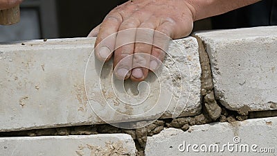 Male Builder Laying White Brick on Cement and Standing Wall. Hands of ...