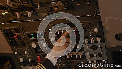 Male Captain Pushing Dashboard Buttons To Start Airplane Engine Stock ...