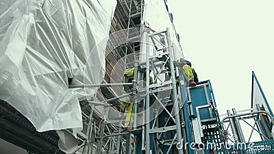 Male Construction Workers, Light Green Uniforms,Suits Stand at Working ...