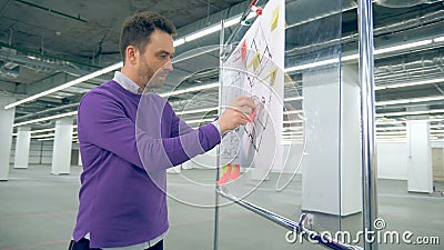 Male Engineer Working with a Scheme, Engineering Equipment. Stock Video ...