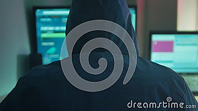 Male Hacker Internet Working on a Computer. Man Hacker in Indoor Hood ...