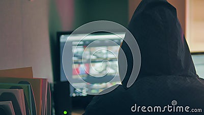 Male Hacker Internet Working on a Computer. Man Indoor Hacker in Hood ...