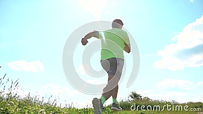 Male runner back view stock video. Video of athlete - 140309913