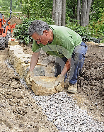 Man Building Stone Wall Royalty Free Stock Images - Image: 17735239