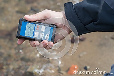 Man Checking Radiation With Geiger Counter Stock Photo | CartoonDealer ...