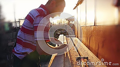 Man is Craft Working at a Work Bench with Power Tools in Slowmotion ...