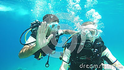 Diver Waving Hello Underwater in Atlantic Ocean. Stock Footage - Video ...