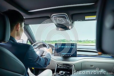 A Man Driving Inside Of Electric Car. Electric Car. EV Car. EV Vehicle ...