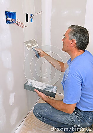 Man Finishing Drywall Stock Photo - Image: 11095240