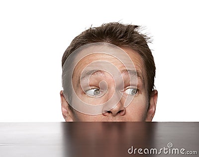 Man Hiding Behind Desk Royalty Free Stock Images - Image: 13595239