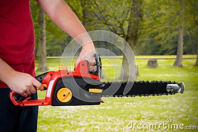 Man Holding Chainsaw Stock Photo - Image: 14085560