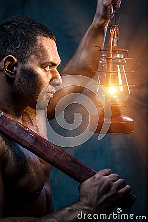 Man Holding Pickaxe And Oil Lamp Royalty Free Stock Photo - Image: 32236725