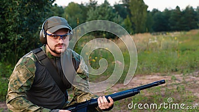 A Man In Military Uniform With A Gun Shooting Stock Video - Video of ...