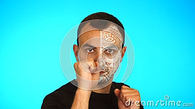 Man with Painted Face is Standing in Boxer Pose and Looking at Camera ...