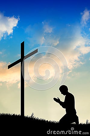 Man Praying At Cross