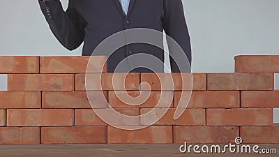 Hand Puts the Brick into the Wall Stock Video - Video of currency ...